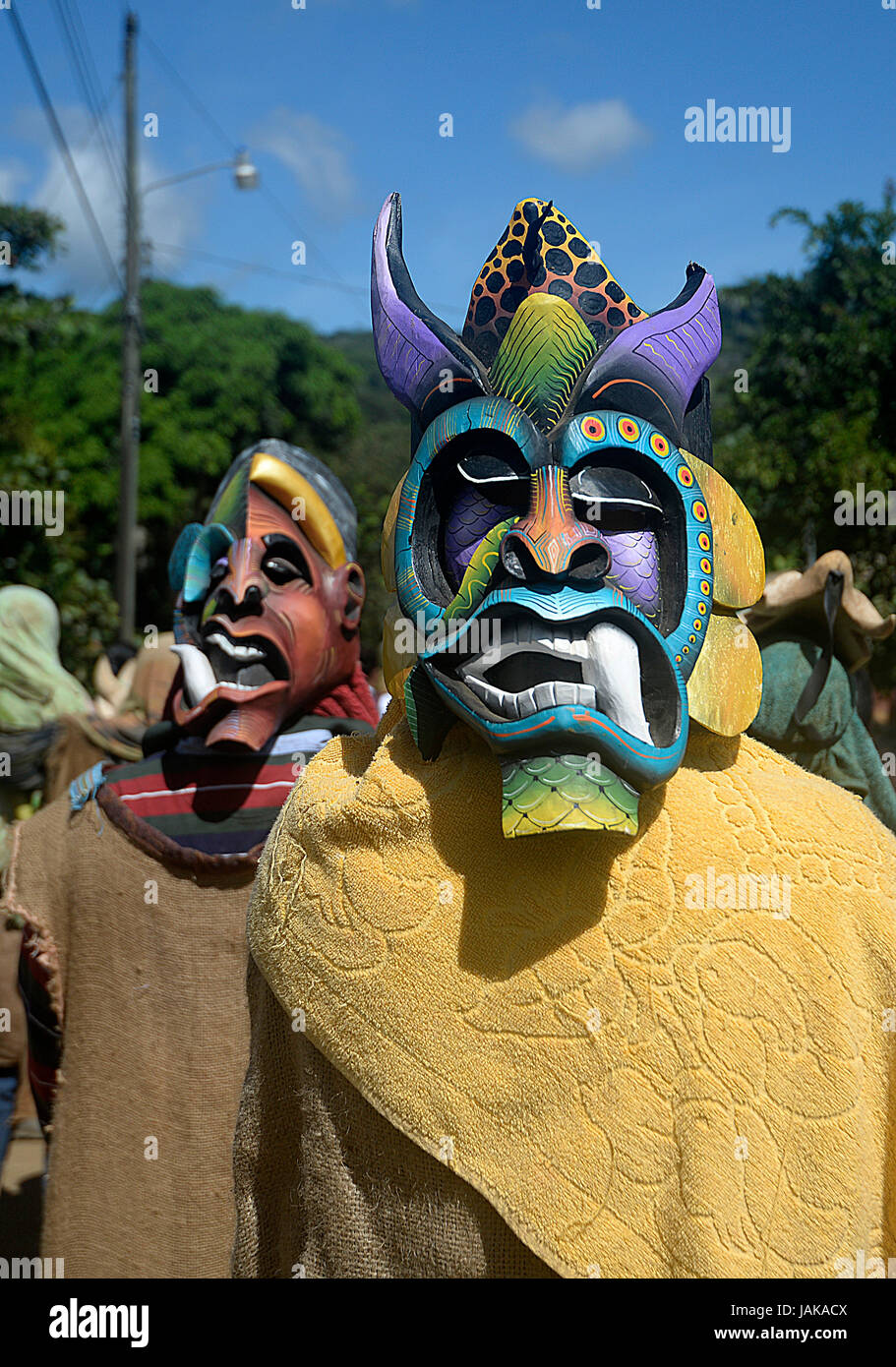 Devils walk through the streets with masks during the Juegos de los ...