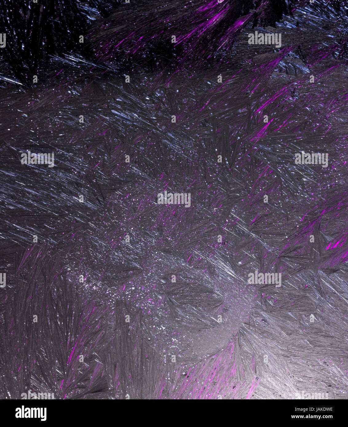 ice block structure with frost pattern, illuminated with violet effect ...