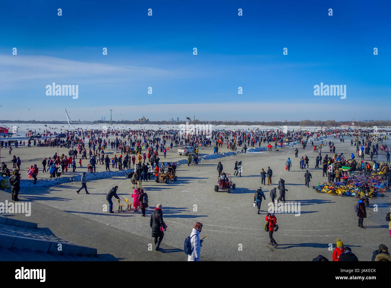 Harbin, China - February 9, 2017: Crowds of people ice skating on ...