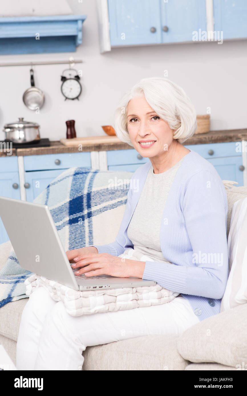 Grandmother using laptop computer Stock Photo - Alamy