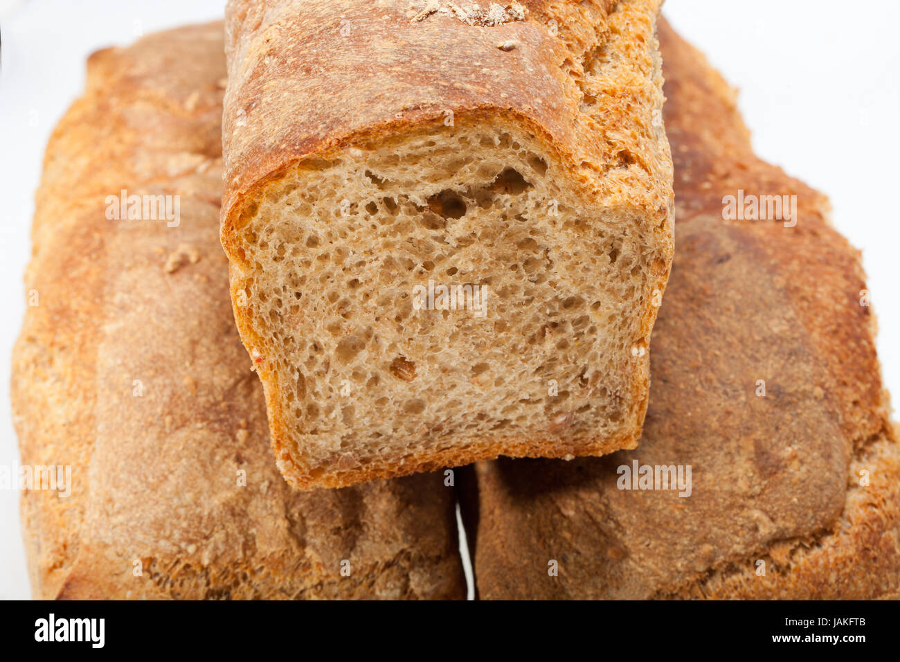 loaves of bread traditionally roasted. Background. Close up Stock Photo ...