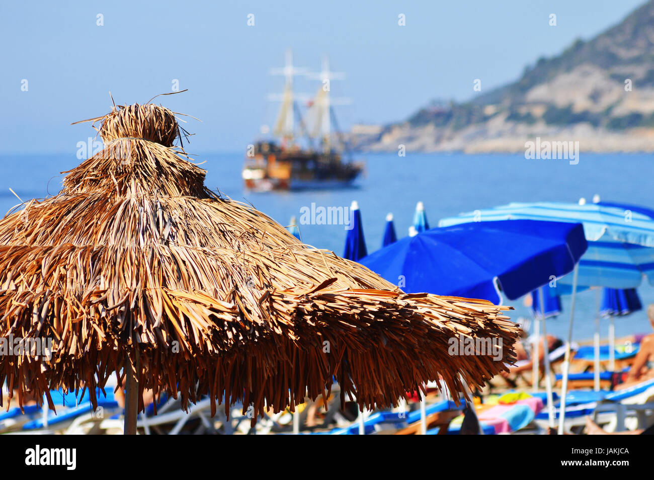 Mediterranean beach during hot summer day Stock Photo - Alamy