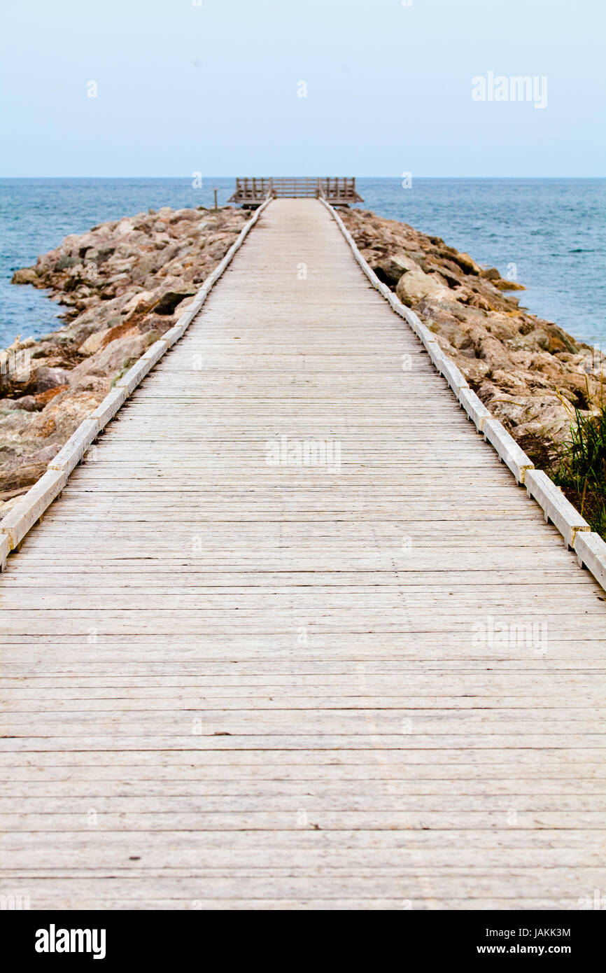 Long Wooden Dock with Observatory and Beautiful View of the Calm Ocean ...