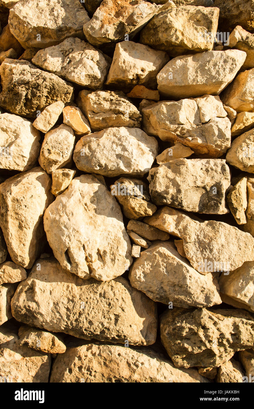 Stone wall in a mediterranean town Stock Photo - Alamy