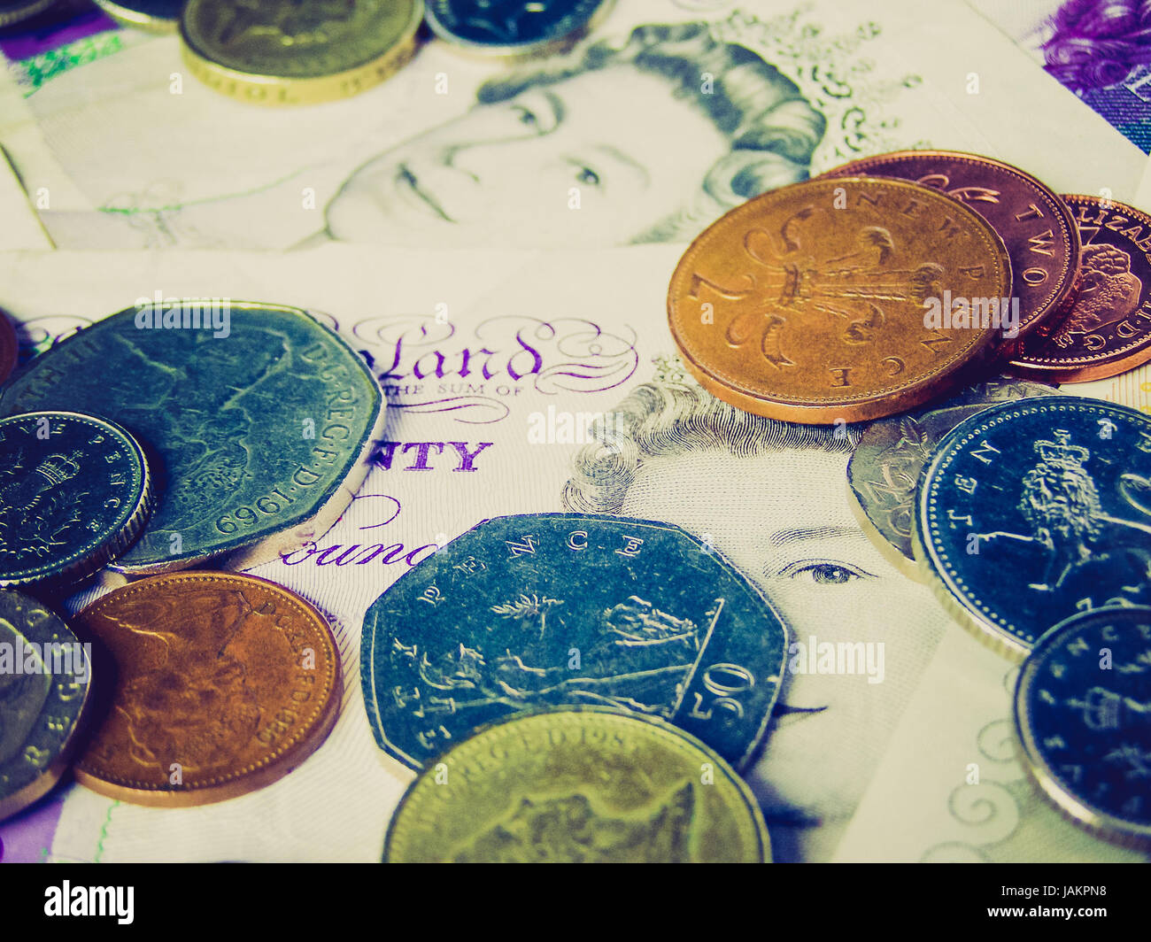 Vintage looking British Pounds banknotes and coins Stock Photo - Alamy