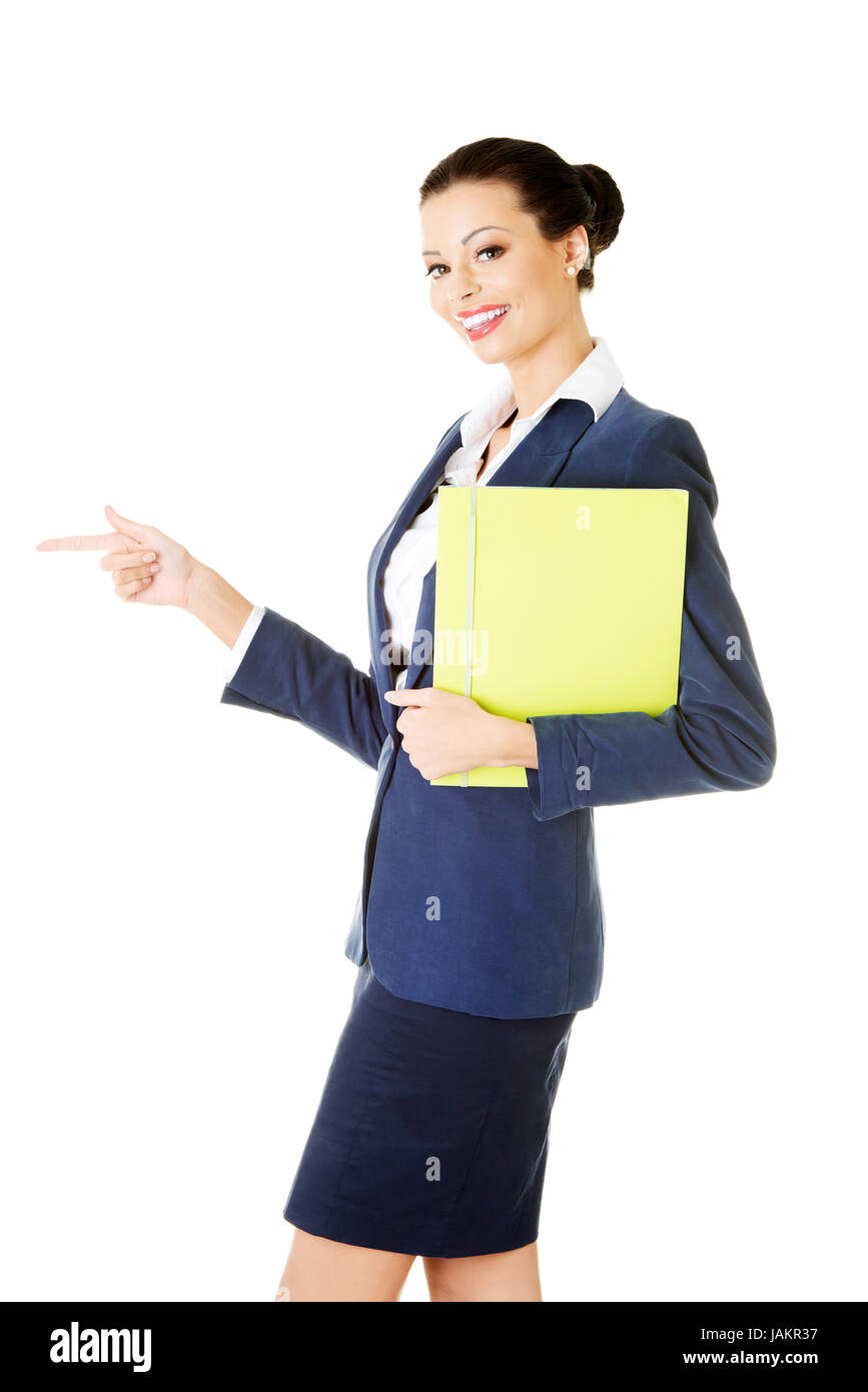 Attractive woman holding files. Isolated on white Stock Photo - Alamy