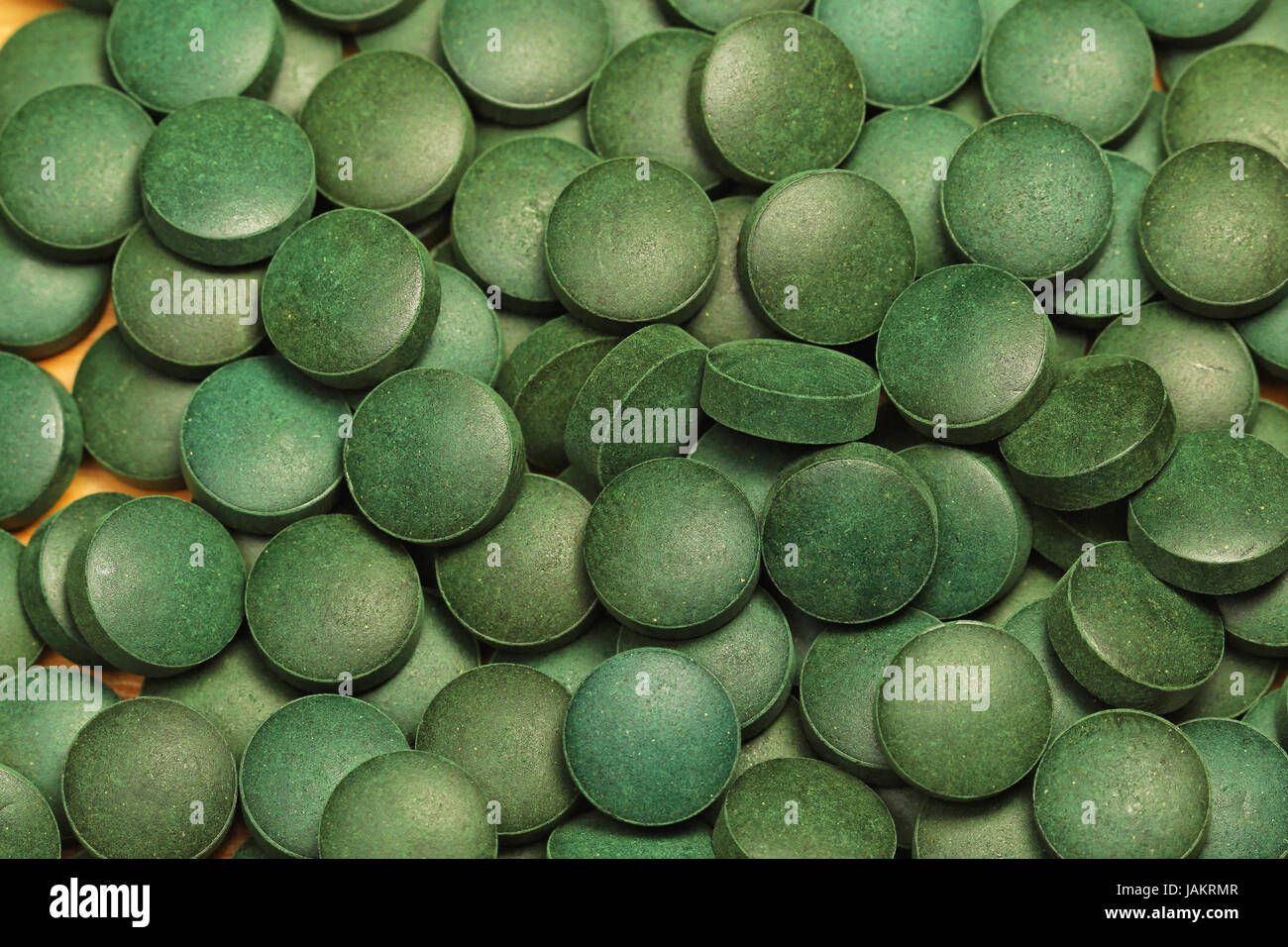 Natural organic green algae Spirulina tablets Stock Photo - Alamy