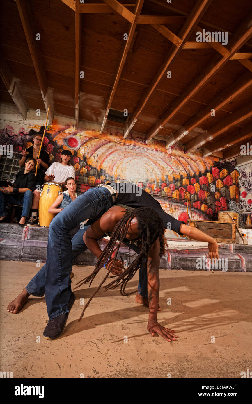 Young group of capoeira performers working out with music Stock Photo ...