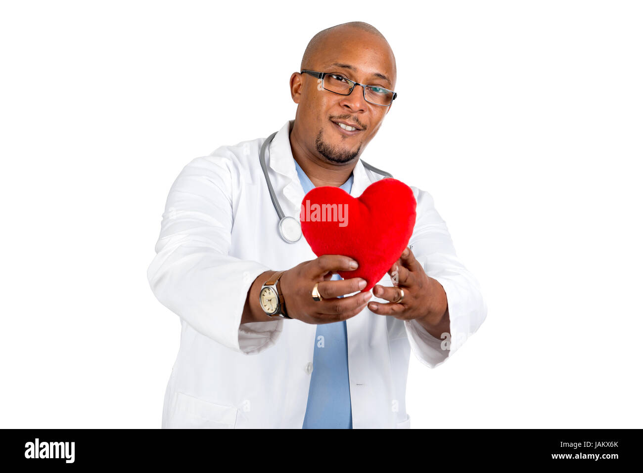 Dark skin doctor posing with a big red heart Stock Photo - Alamy