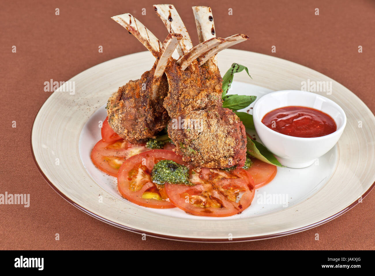 roasted lamb rib chops with vegetables Stock Photo - Alamy