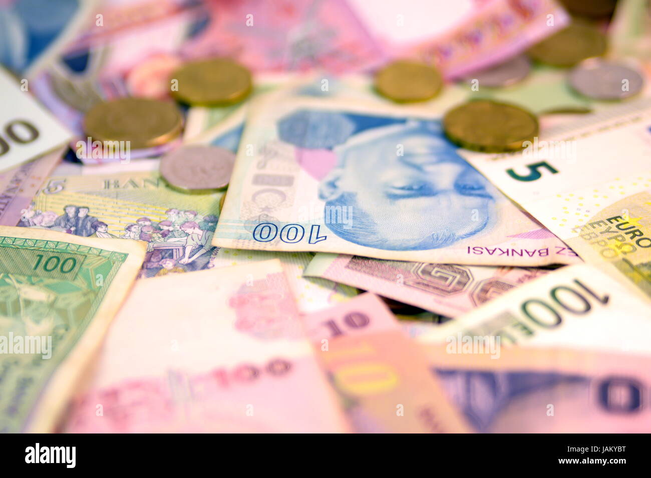 Different currency note and coins from different countries background ...