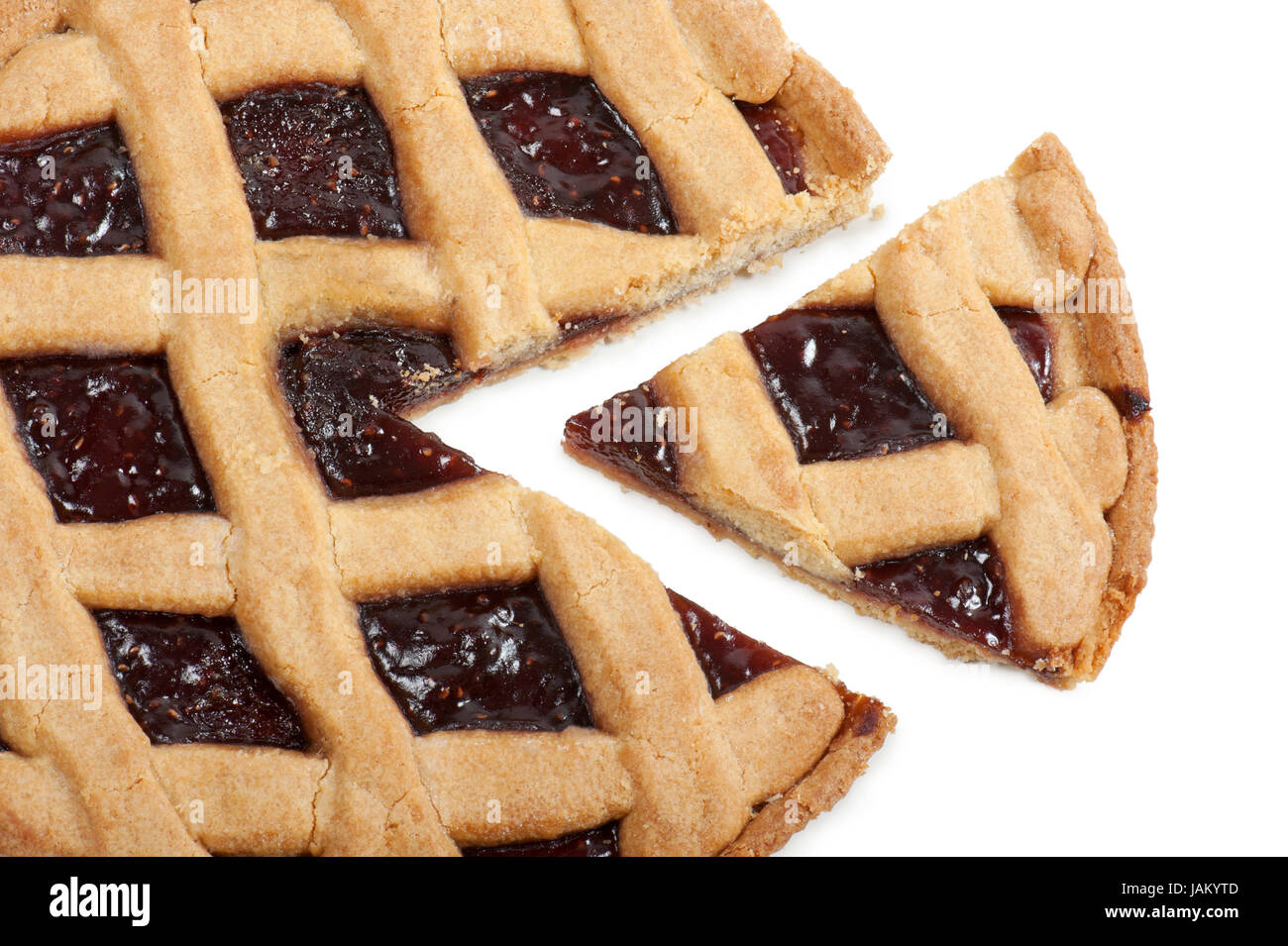 fruit tart cut with slice, on white background Stock Photo - Alamy