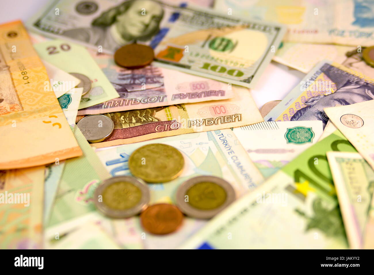 Different currency note and coins from different countries background ...