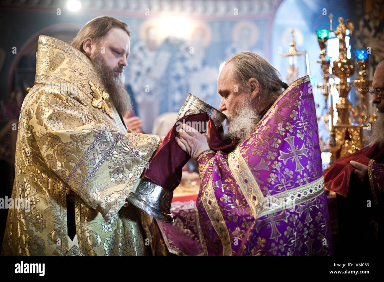 Orthodox priest communion hi-res stock photography and images - Alamy