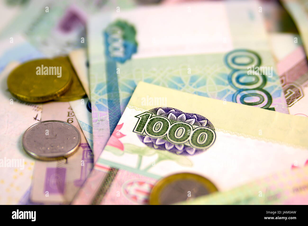 Different currency note and coins from different countries background ...