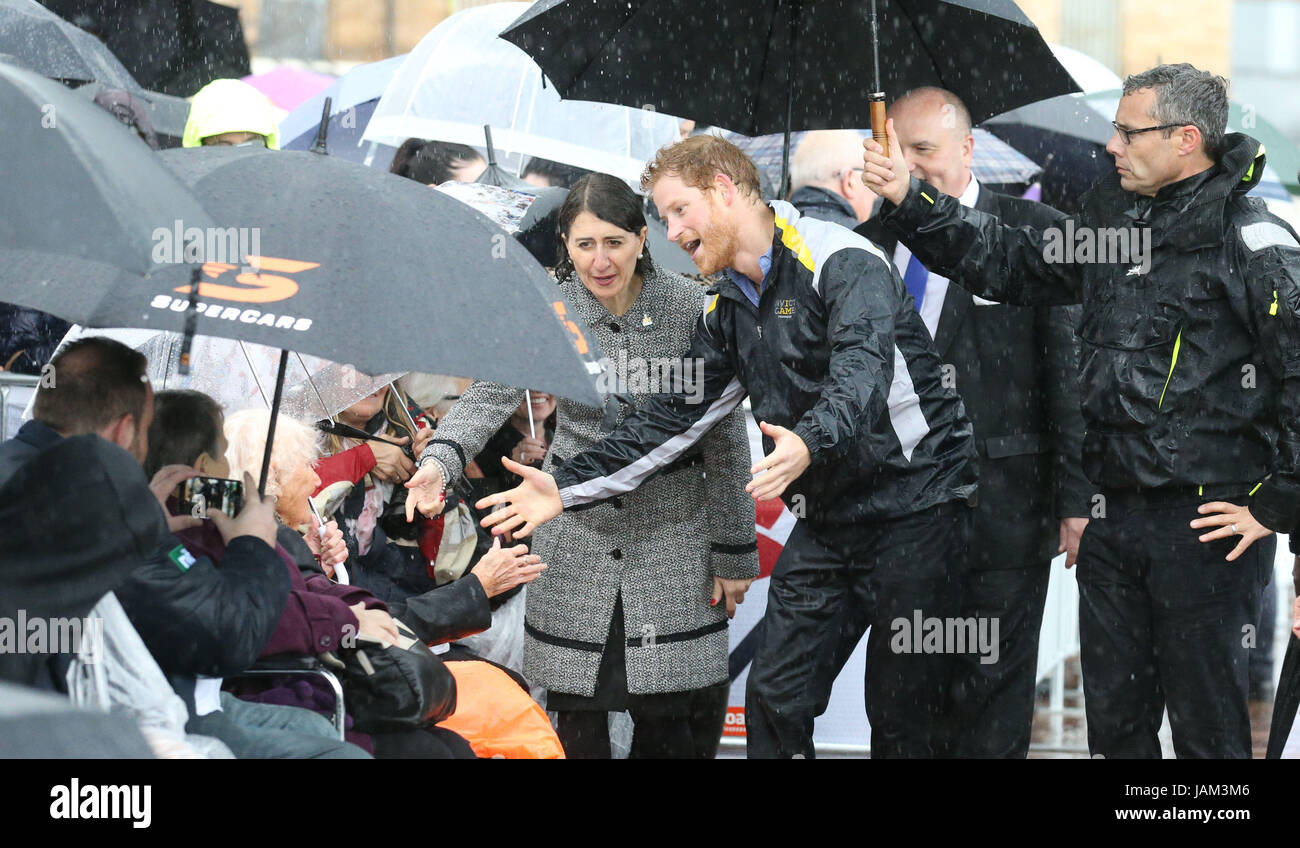Prince Harry reaches out to Daphne Dunne, 97, on a walkabout on ...