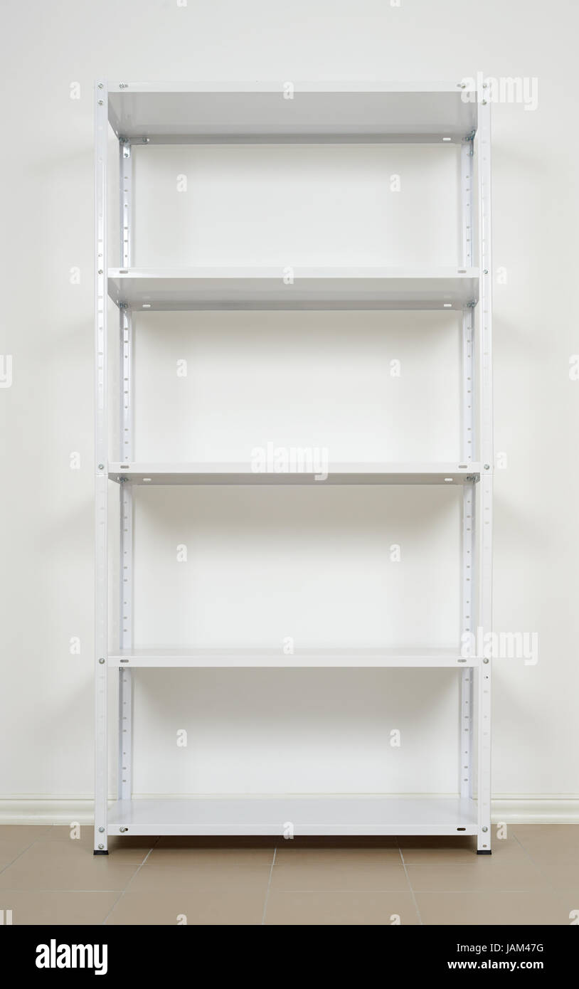 white metal rack near the wall, empty shelves Stock Photo - Alamy