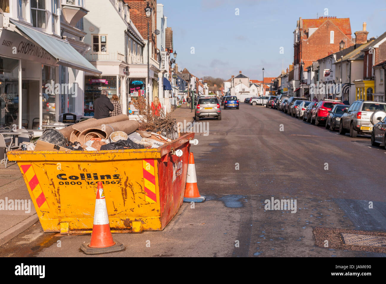 A skip in the street in Aldeburgh , Suffolk , England , Britain , Uk ...