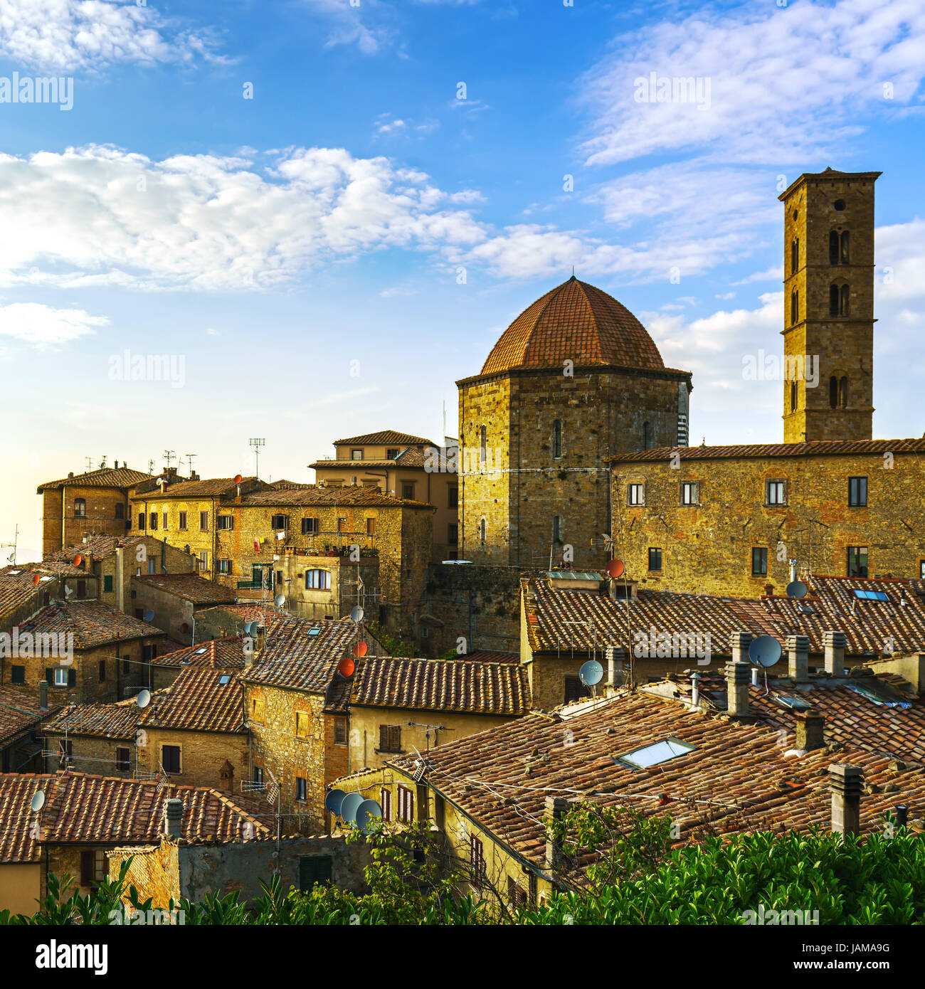 Tuscany, Volterra town skyline, church and campanile tower on sunset ...