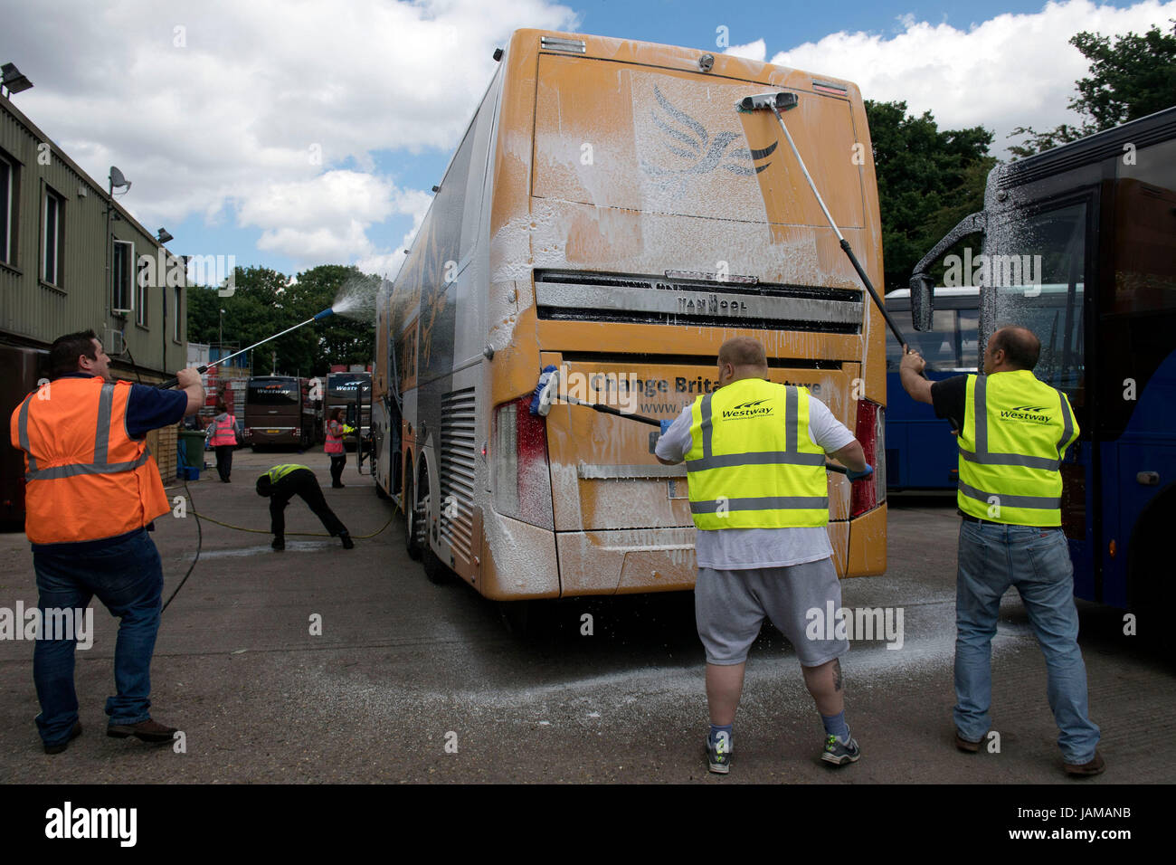 The Liberal Democrats battle bus is cleaned in south west London after ...