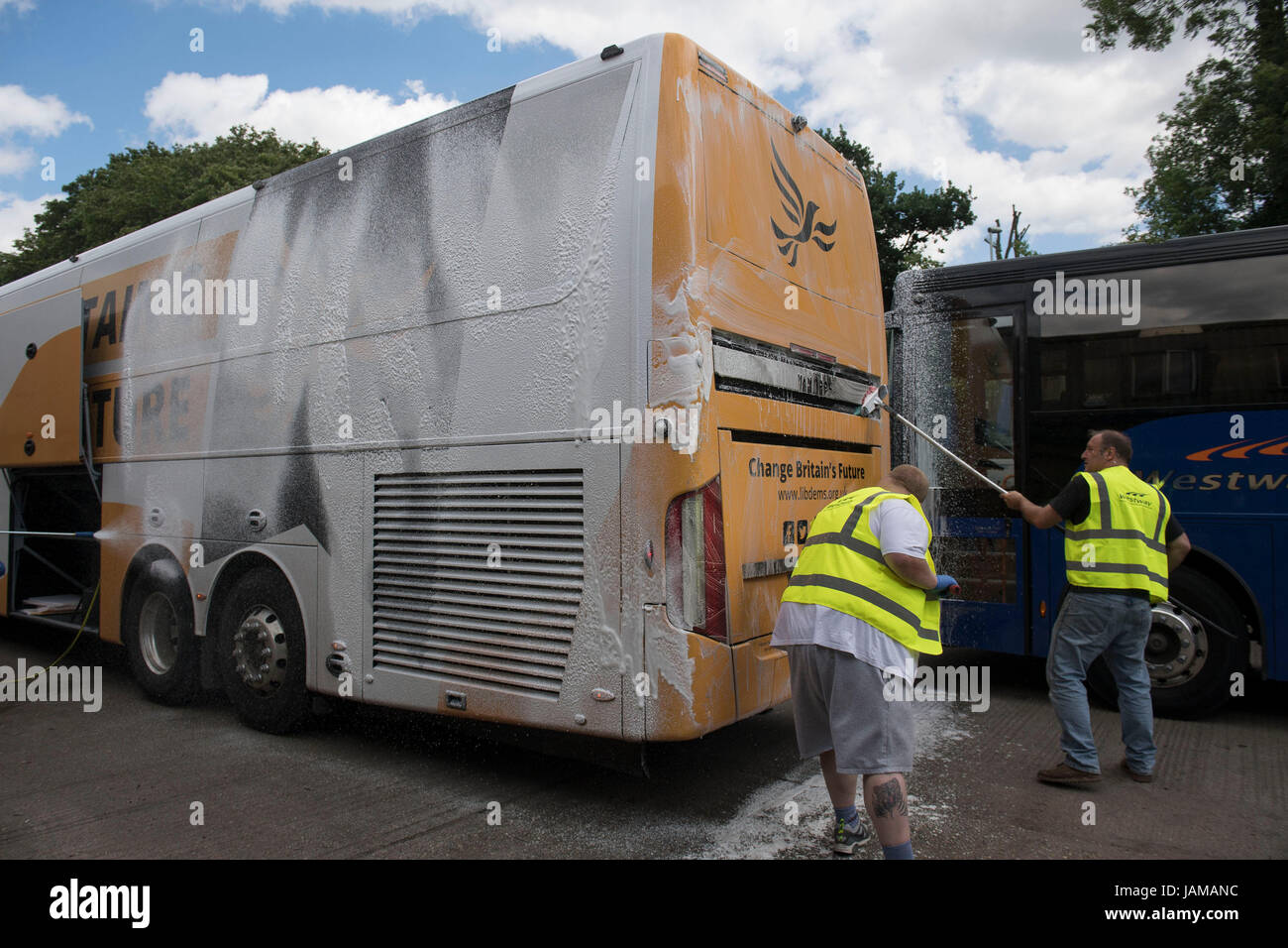 The Liberal Democrats battle bus is cleaned in south west London after ...