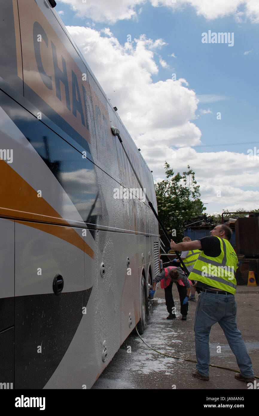 The Liberal Democrats battle bus is cleaned in south west London after ...