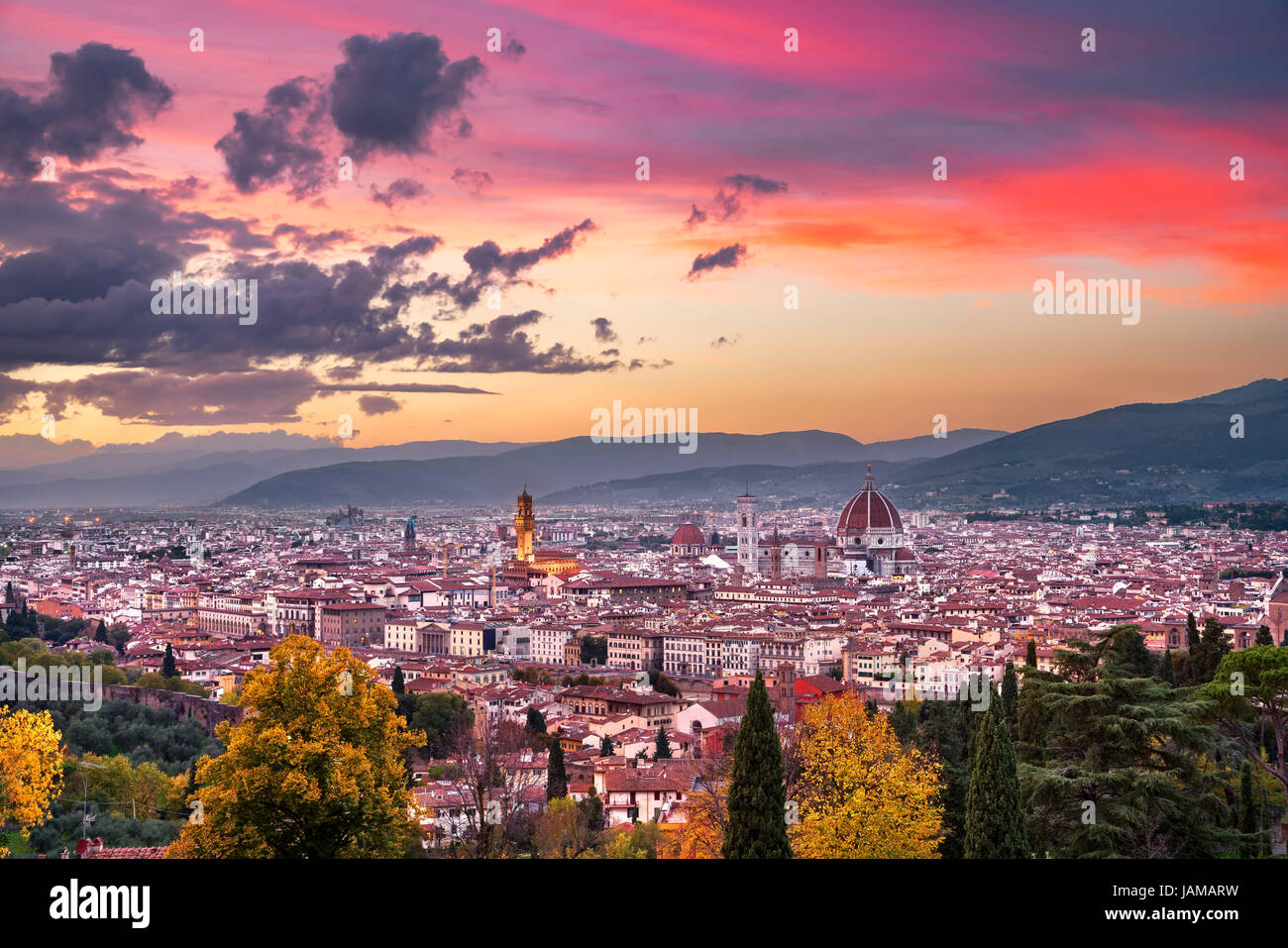 Florence or Firenze sunset aerial cityscape. Palazzo Vecchio and Duomo ...