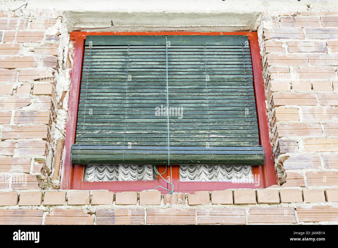 Closed window with green shutters urban building , construction Stock ...