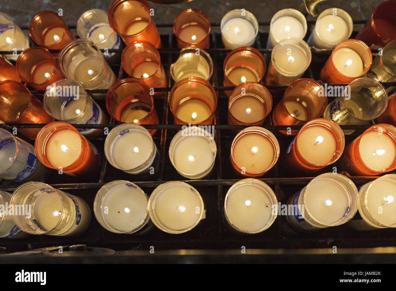 Church Burning candles, religious symbol and offering Stock Photo - Alamy