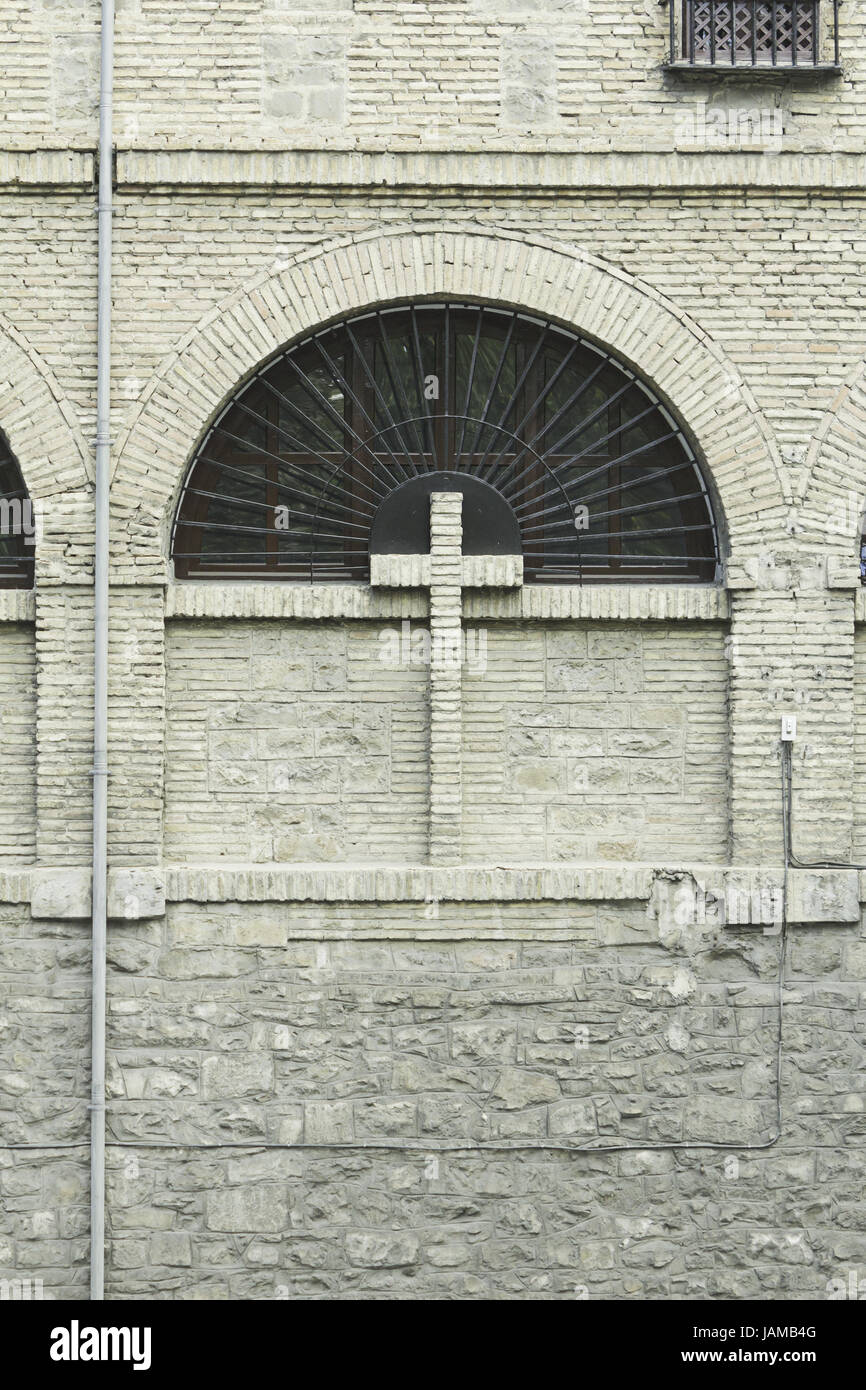 Religious Cross Bow with stone, old building Stock Photo - Alamy