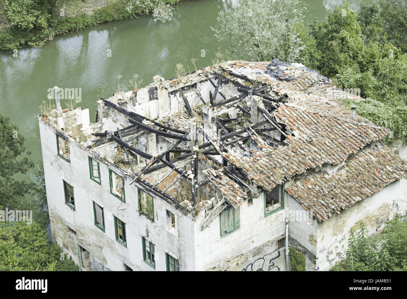 House destroyed with broken roof tiles, construction and architecture ...