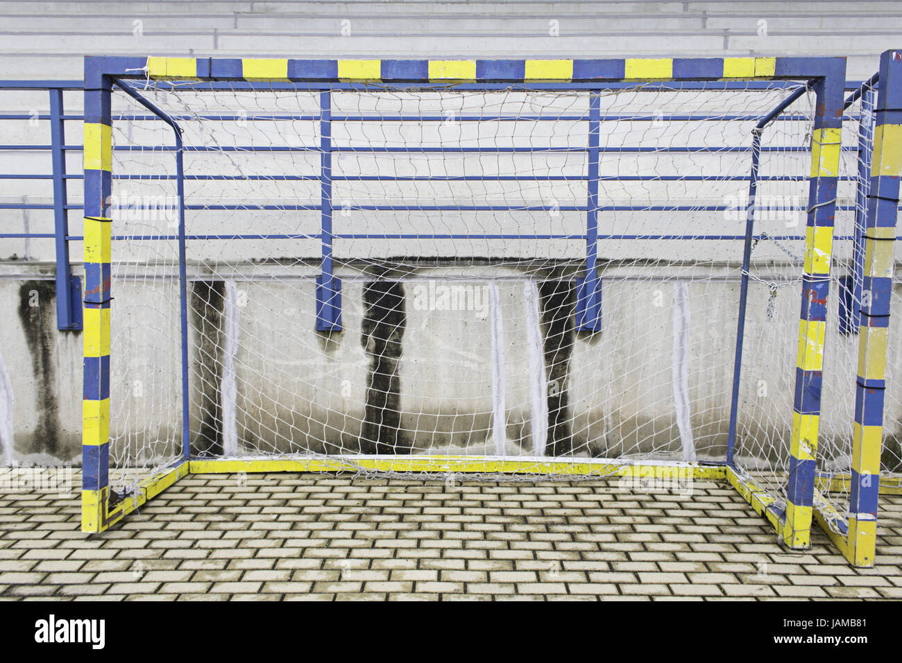 Blue and yellow goal football field, sport and leisure Stock Photo - Alamy