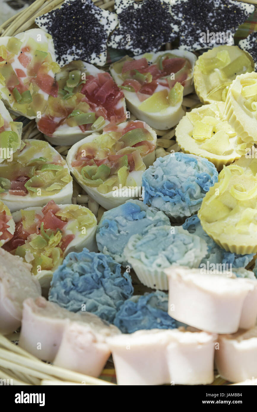 Figures in colored soap crafts market, objects Stock Photo - Alamy