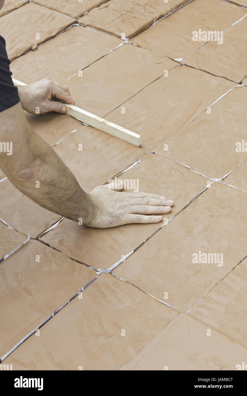 Measuring Artisan craft fair mud, work Stock Photo - Alamy