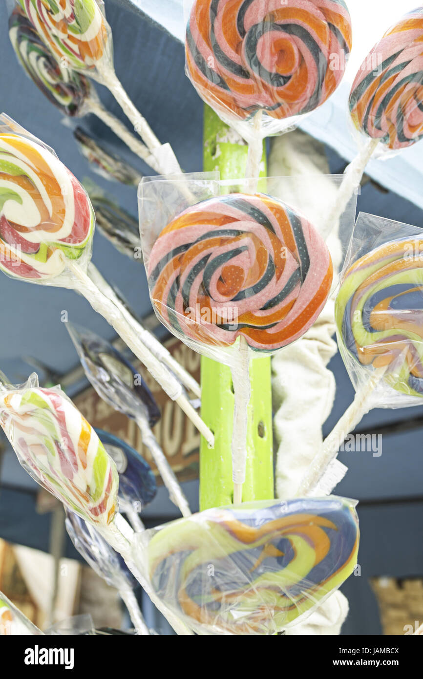 Colorful candy lollipops on feed market, sweets Stock Photo - Alamy