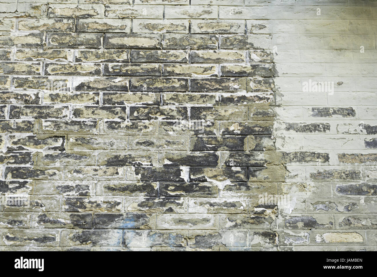 Black stained bricks on exterior wall, construction Stock Photo - Alamy