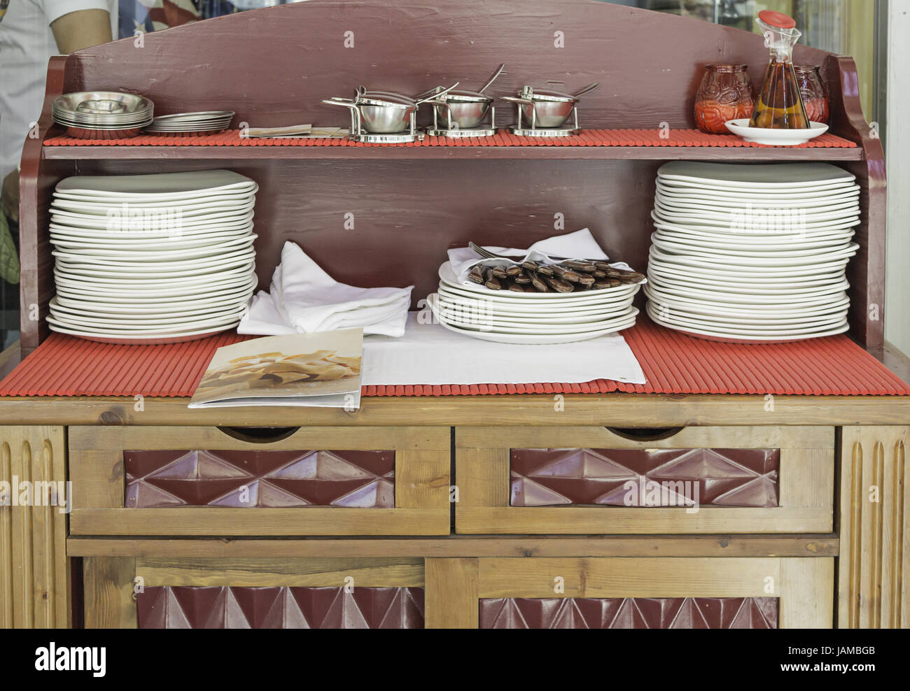 Plates and dishes in restaurant food and feed business Stock Photo - Alamy