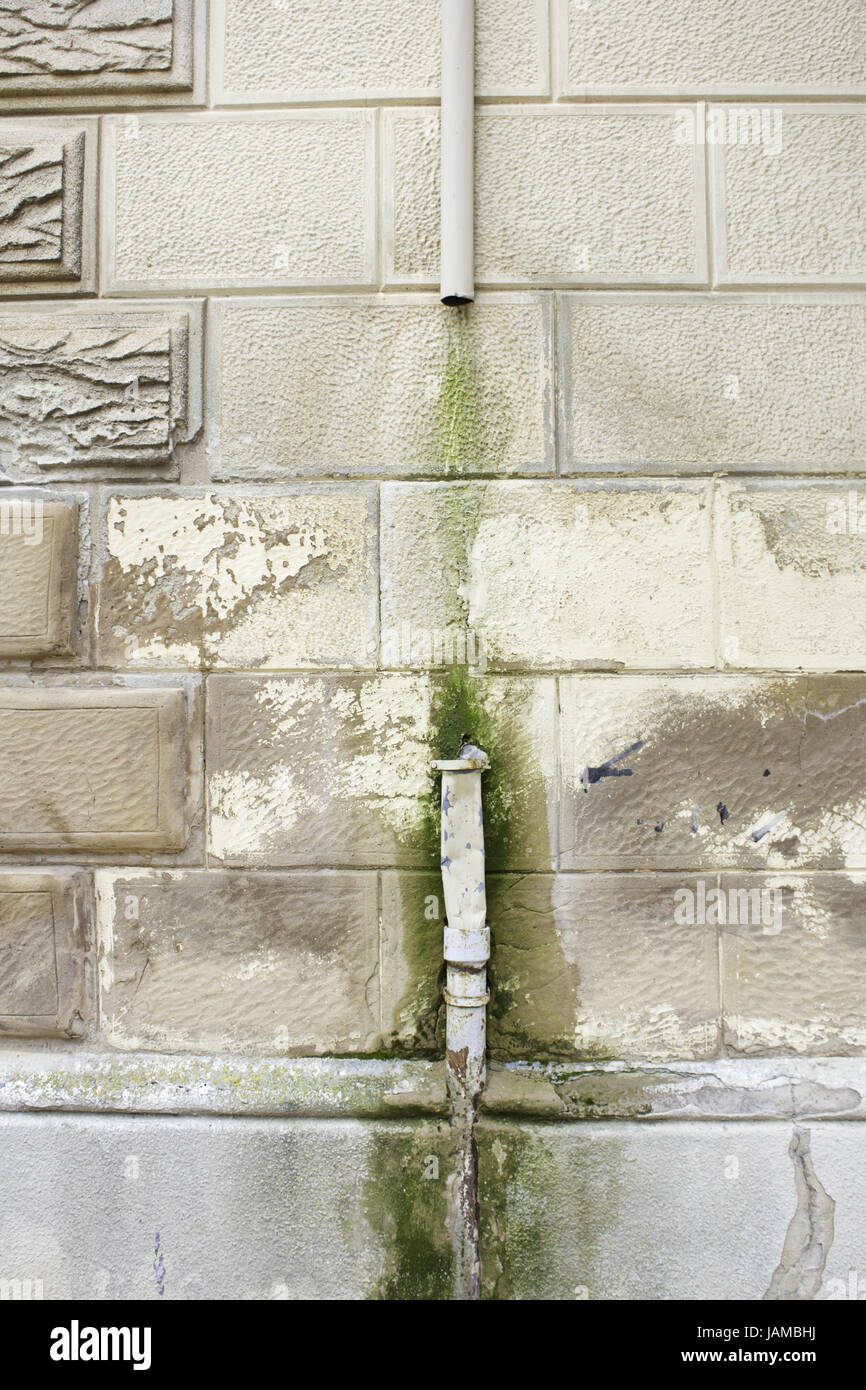 Pipe broken and deteriorated exterior of building, construction and ...