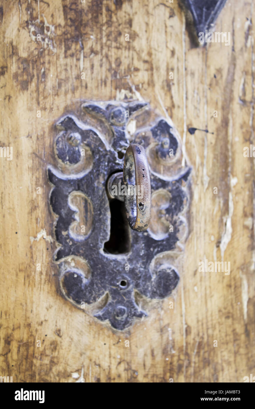 Lock with key on old wooden door, construction and architecture Stock ...