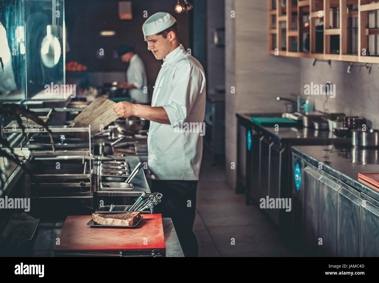 Preparing traditional beef steak Stock Photo - Alamy