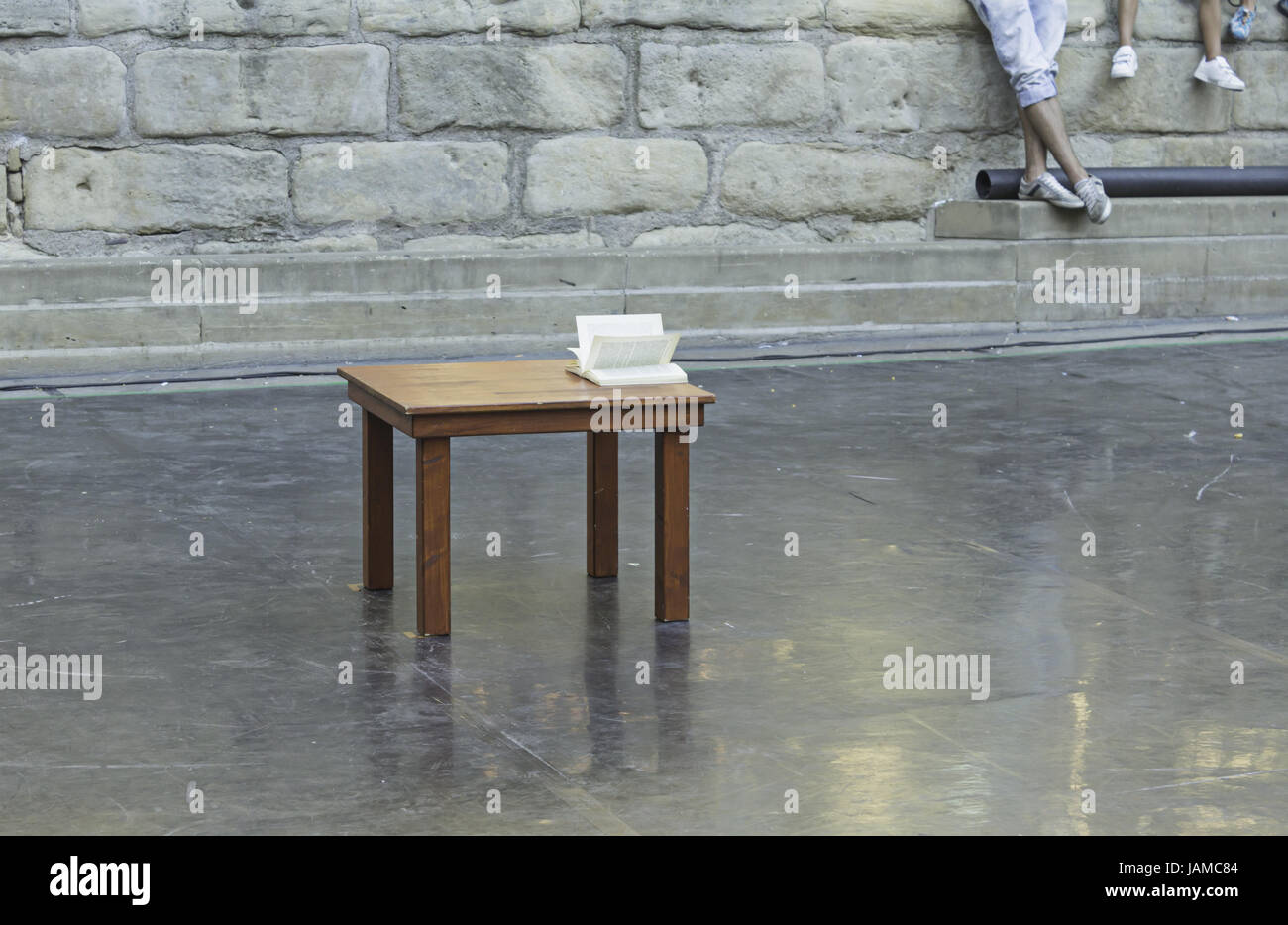 Table with book open urban square, reading and entertainment Stock ...