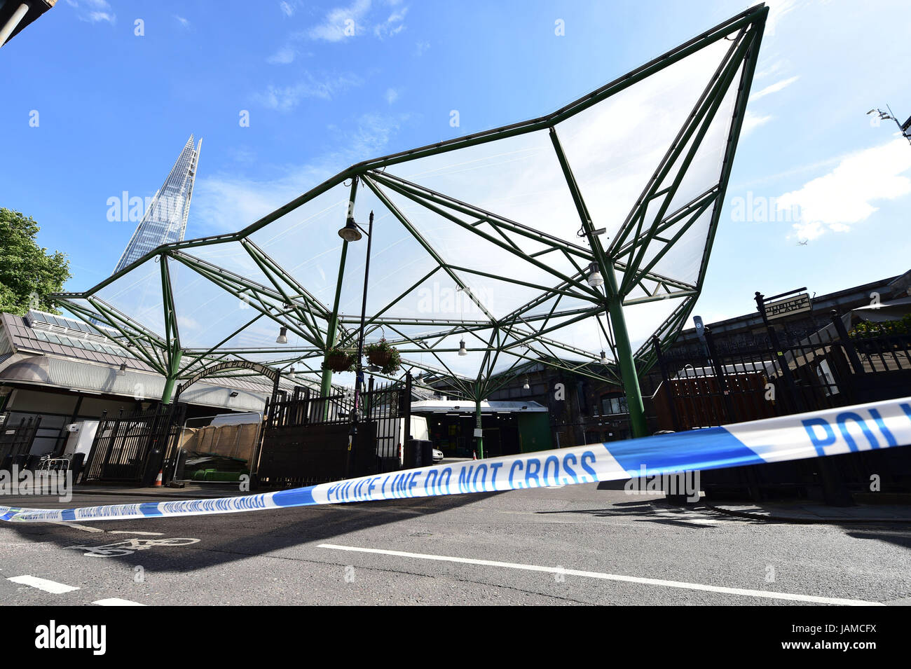 Police tape outside Borough Market after Saturday's terrorist attack in ...