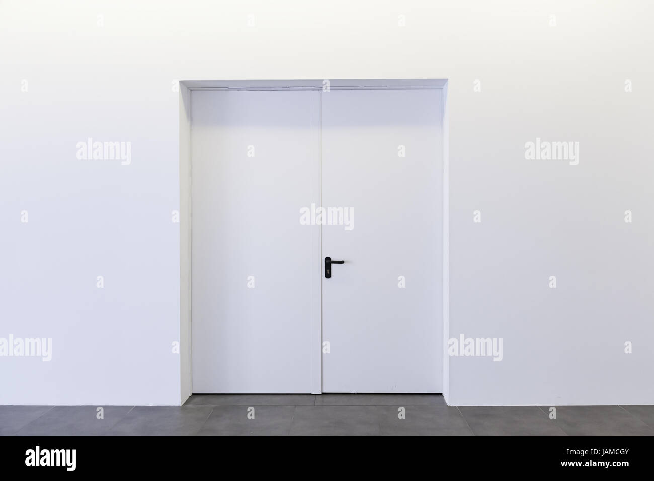 Closed door white building interior walls, construction Stock Photo - Alamy