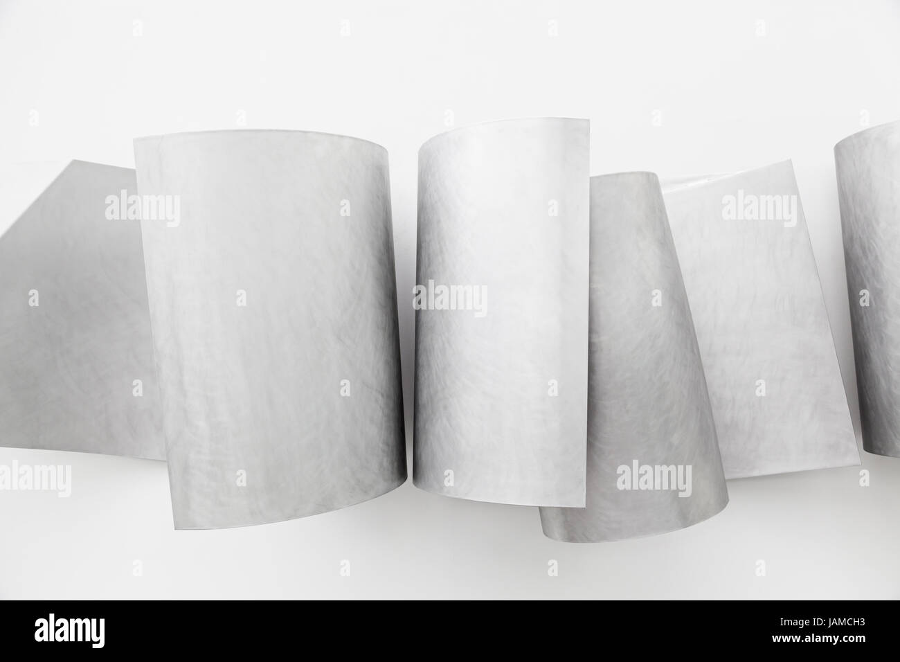 Alloy steel bright wavy walls and metal industry Stock Photo - Alamy