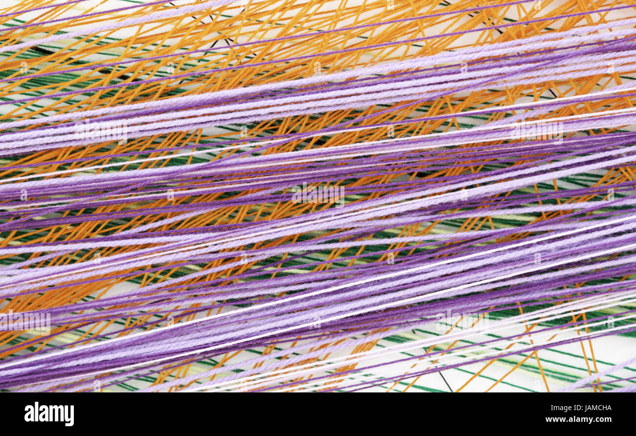 Tangled wool yarn colors, crafts and sewing Stock Photo - Alamy