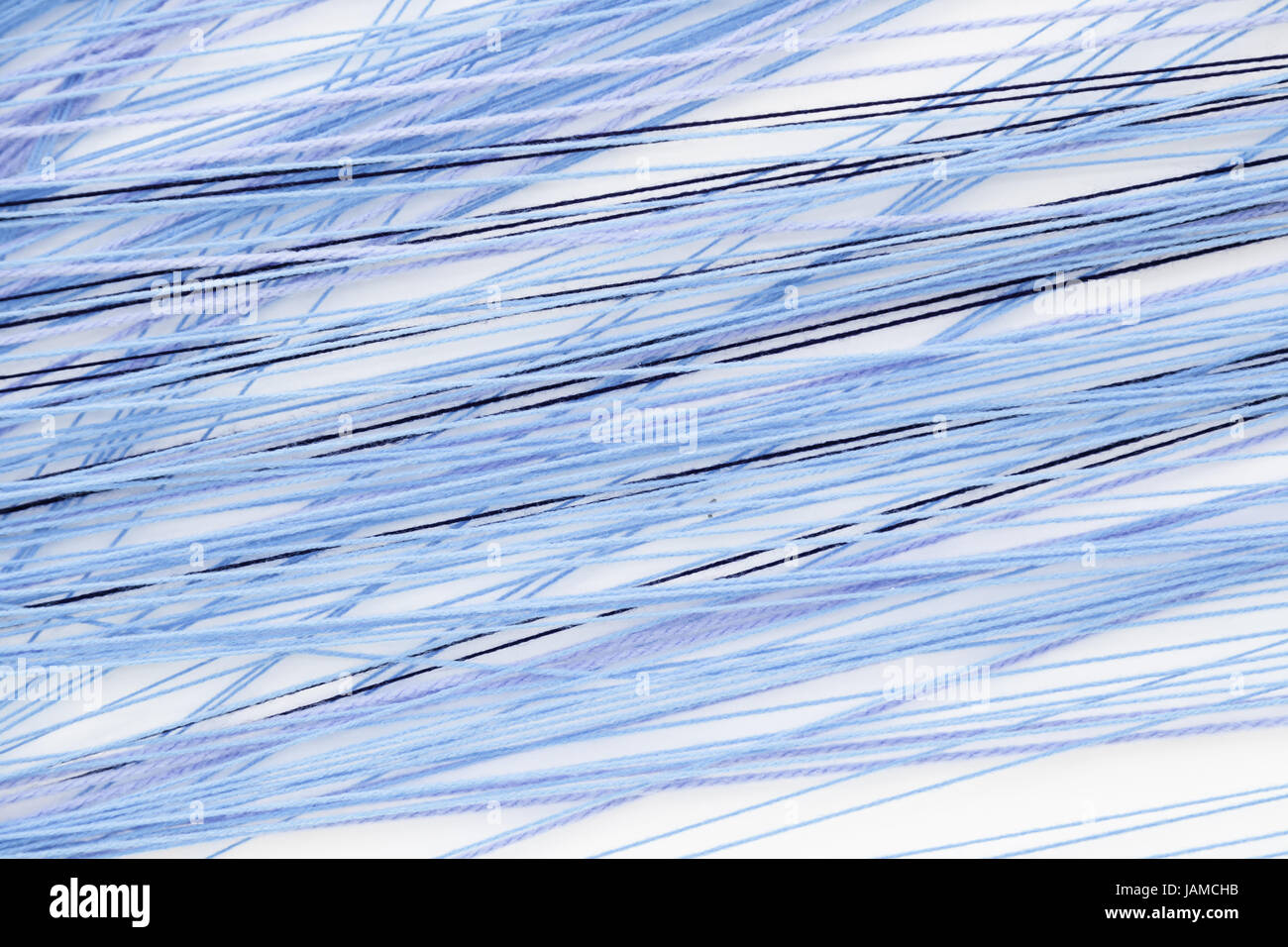 Tangled wool yarn colors, crafts and sewing Stock Photo - Alamy