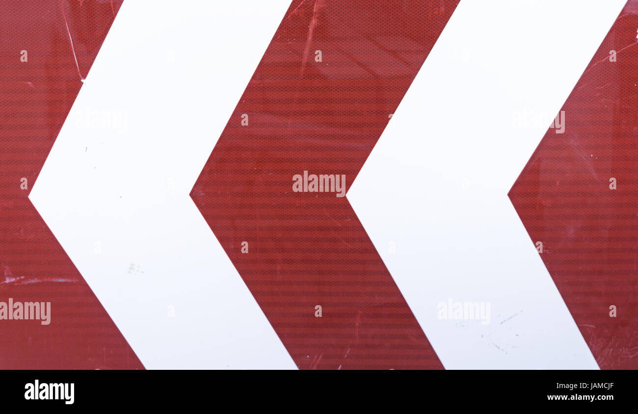 White and red sign with arrow direction traffic, regulations Stock ...