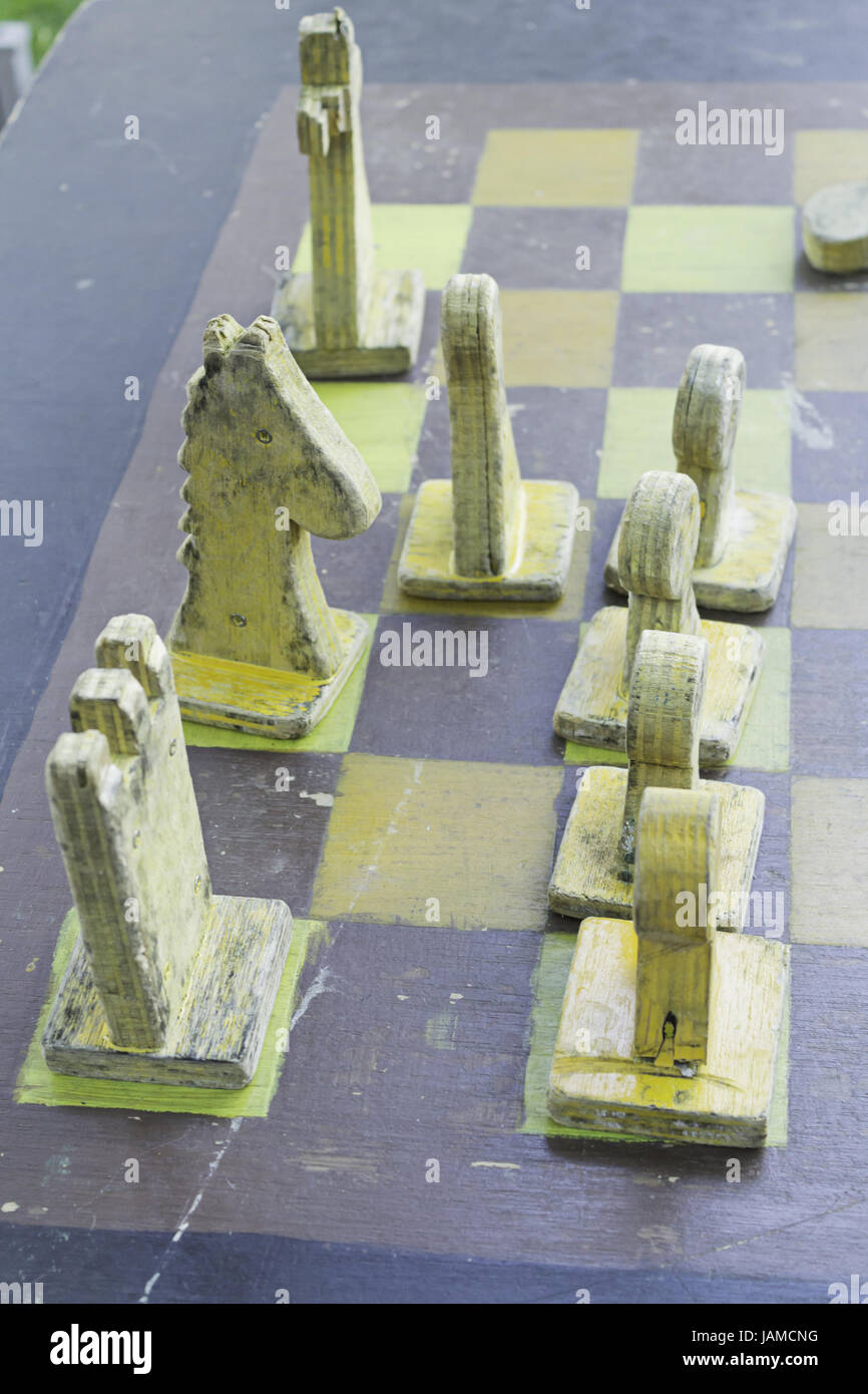 Wooden chess board carved, fun and games Stock Photo - Alamy