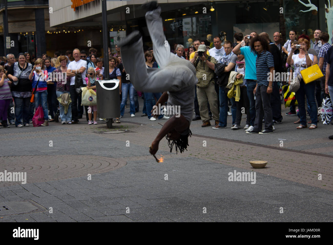 street artists performing a fire show in Cologne, Germany Stock Photo ...