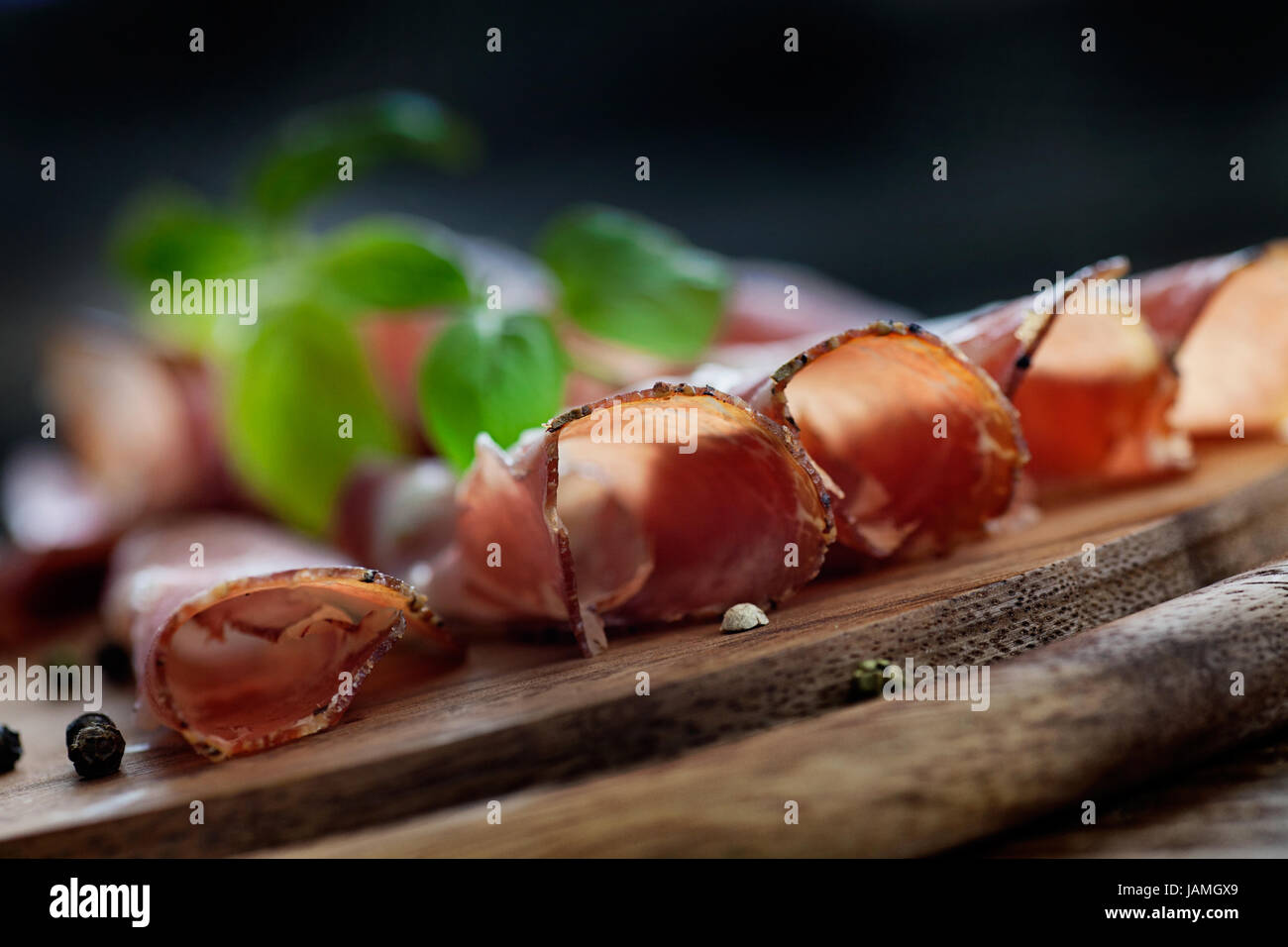 Dried pork collar salami ham with herbs Stock Photo - Alamy